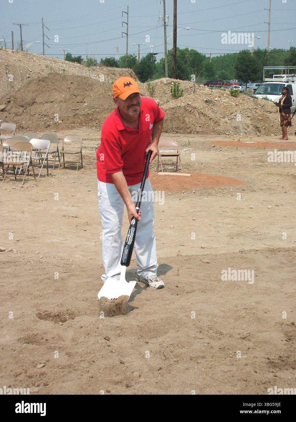 The photo features commemorative bat shovels used during the ...