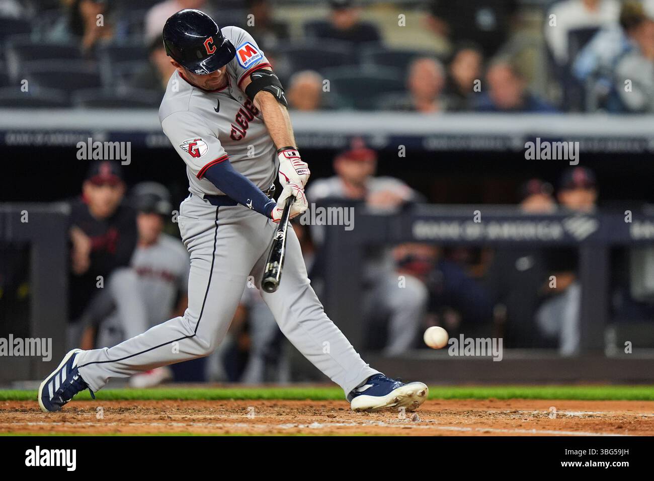 Cleveland Guardians' David Fry hits an RBI single during the seventh inning of a baseball game ...