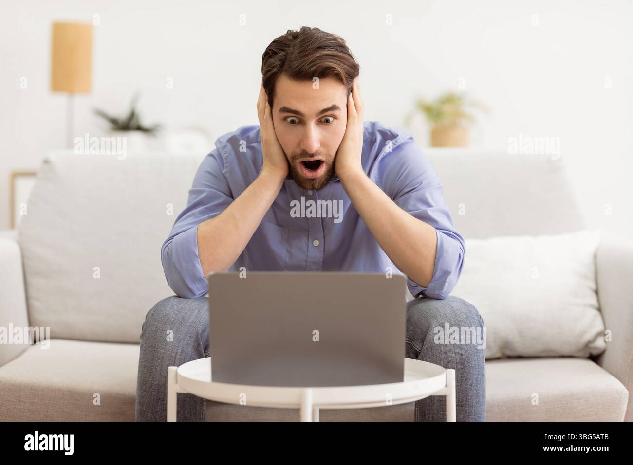 Shocked businessman laptop touching hi-res stock photography and images ...