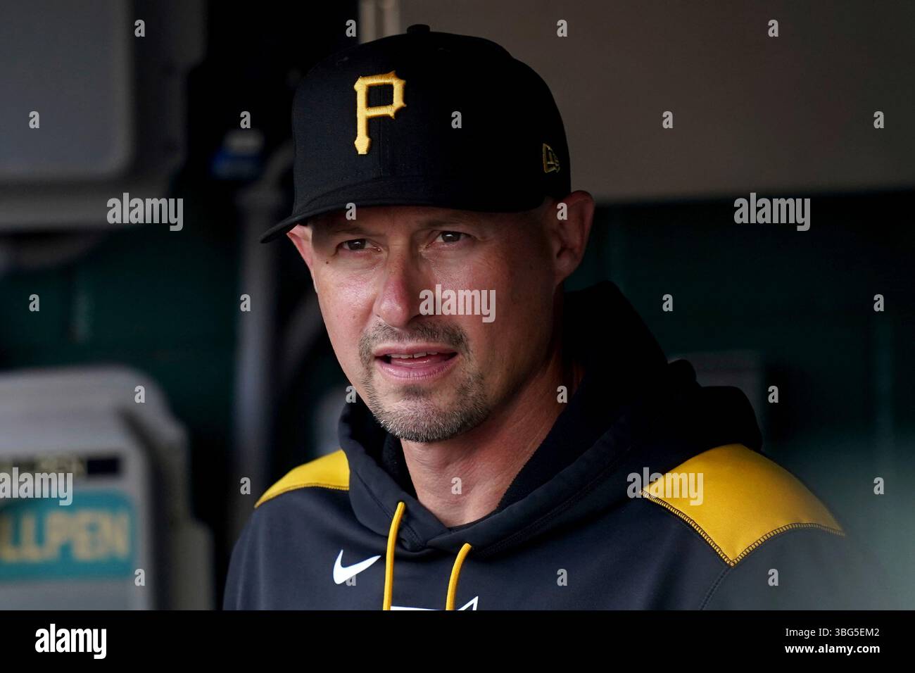 Pittsburgh Pirates manager Don Kelly stands in the dugout before a ...