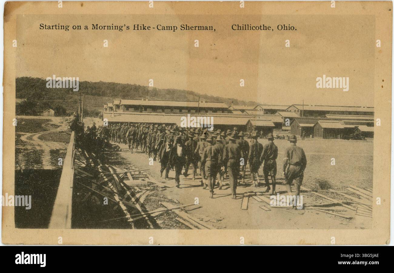 This sepia-tone postcard from 1917 shows soldiers preparing for a ...