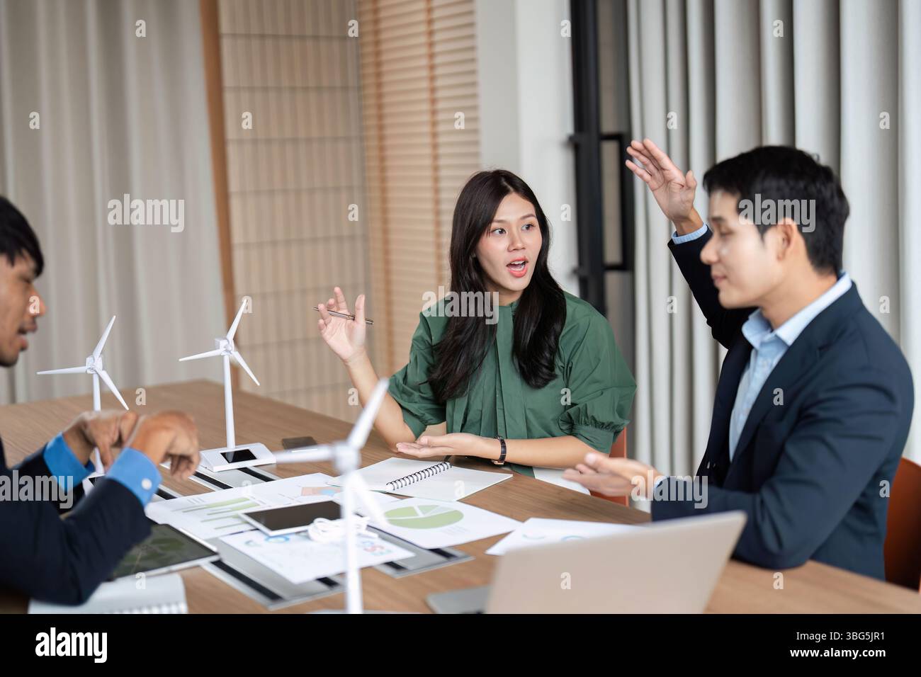 ESG Engagement in Corporate Meeting. Team members discussing ...