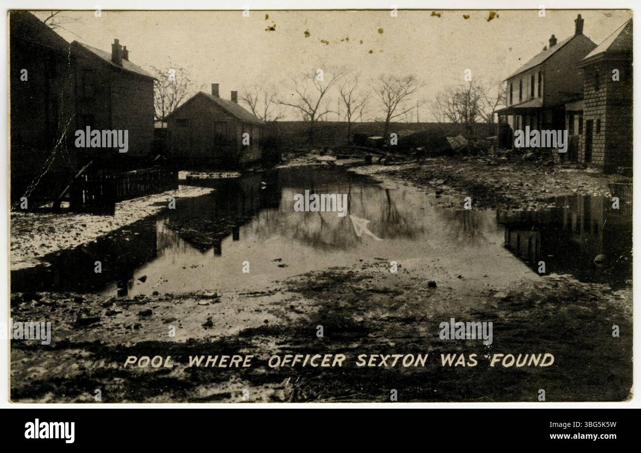 A 1913 black and white photographic postcard showing the pool of water ...