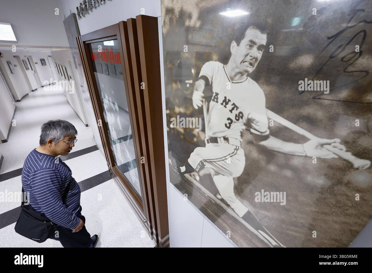 A man visits a baseball stadium in Sakura, the hometown of the late ...