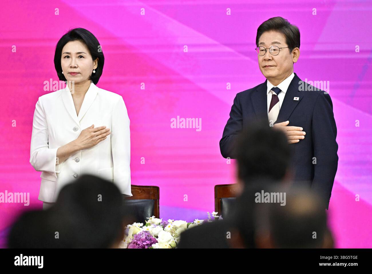 South Korea's newly-elected President Lee Jae-myung and his wife Kim Hea Kyung stand for the ...