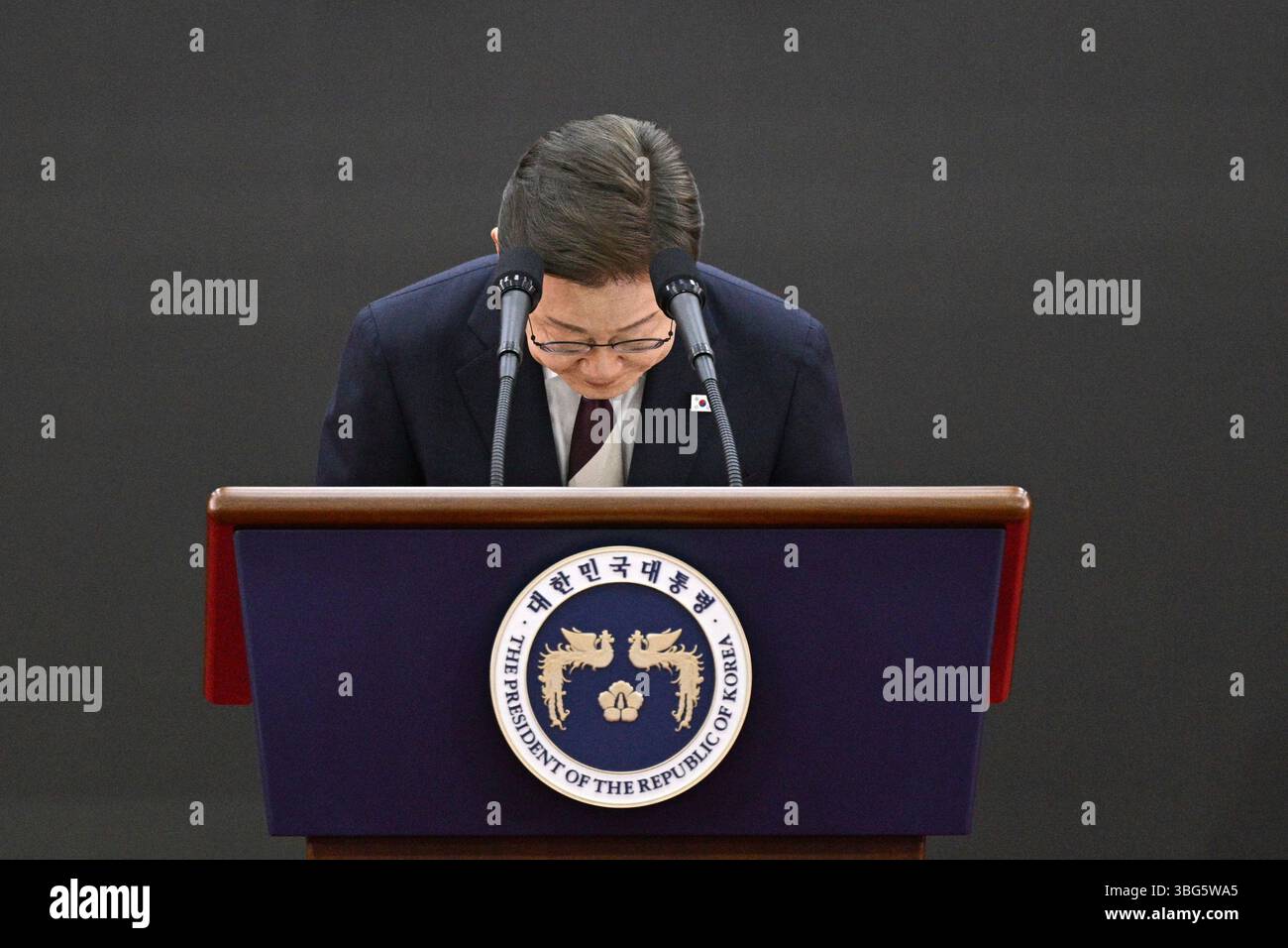 South Korea's President Lee Jae-myung bows as he delivers a speech ...