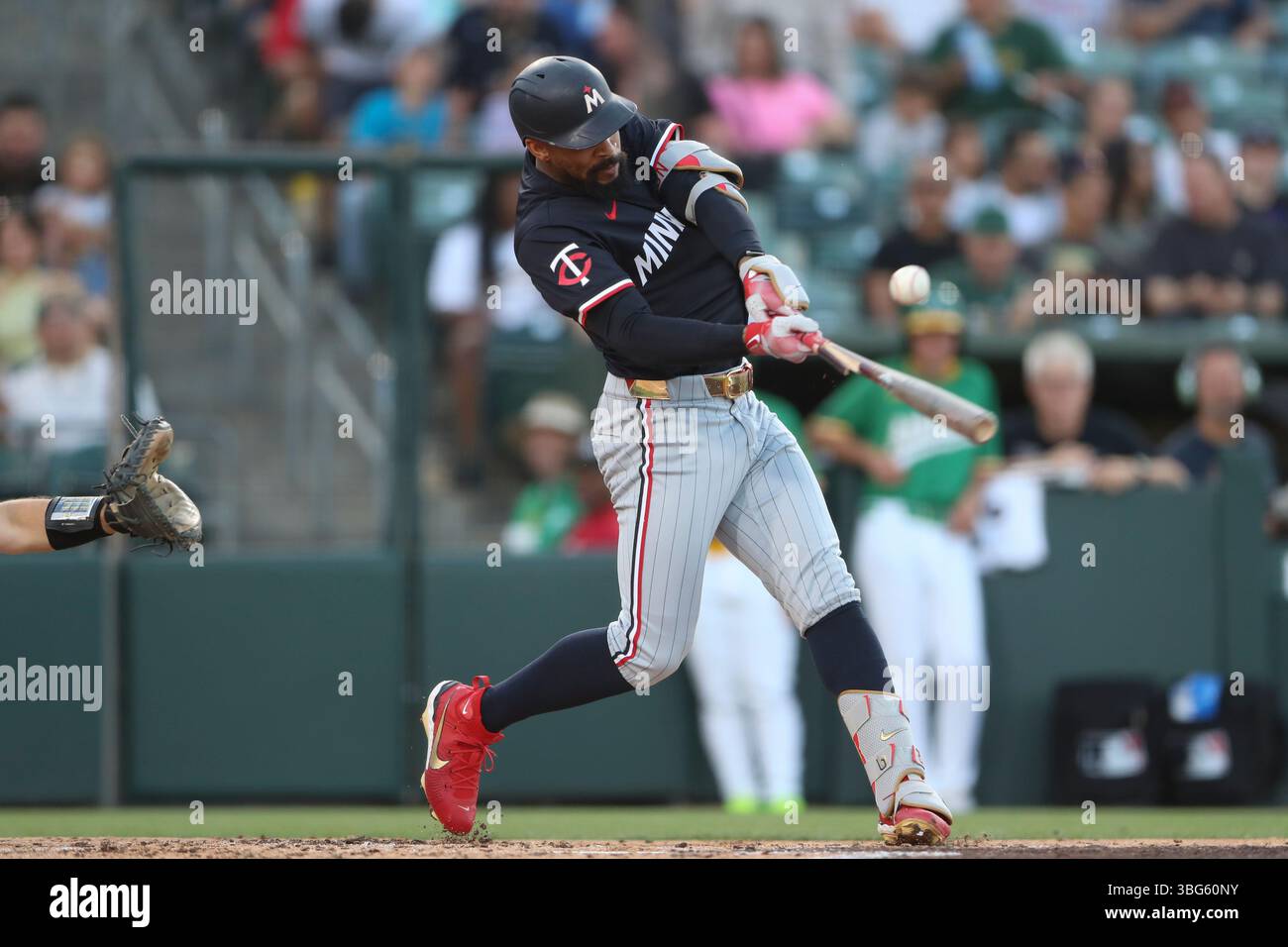 Minnesota Twins' Byron Buxton hits a single against the Athletics ...