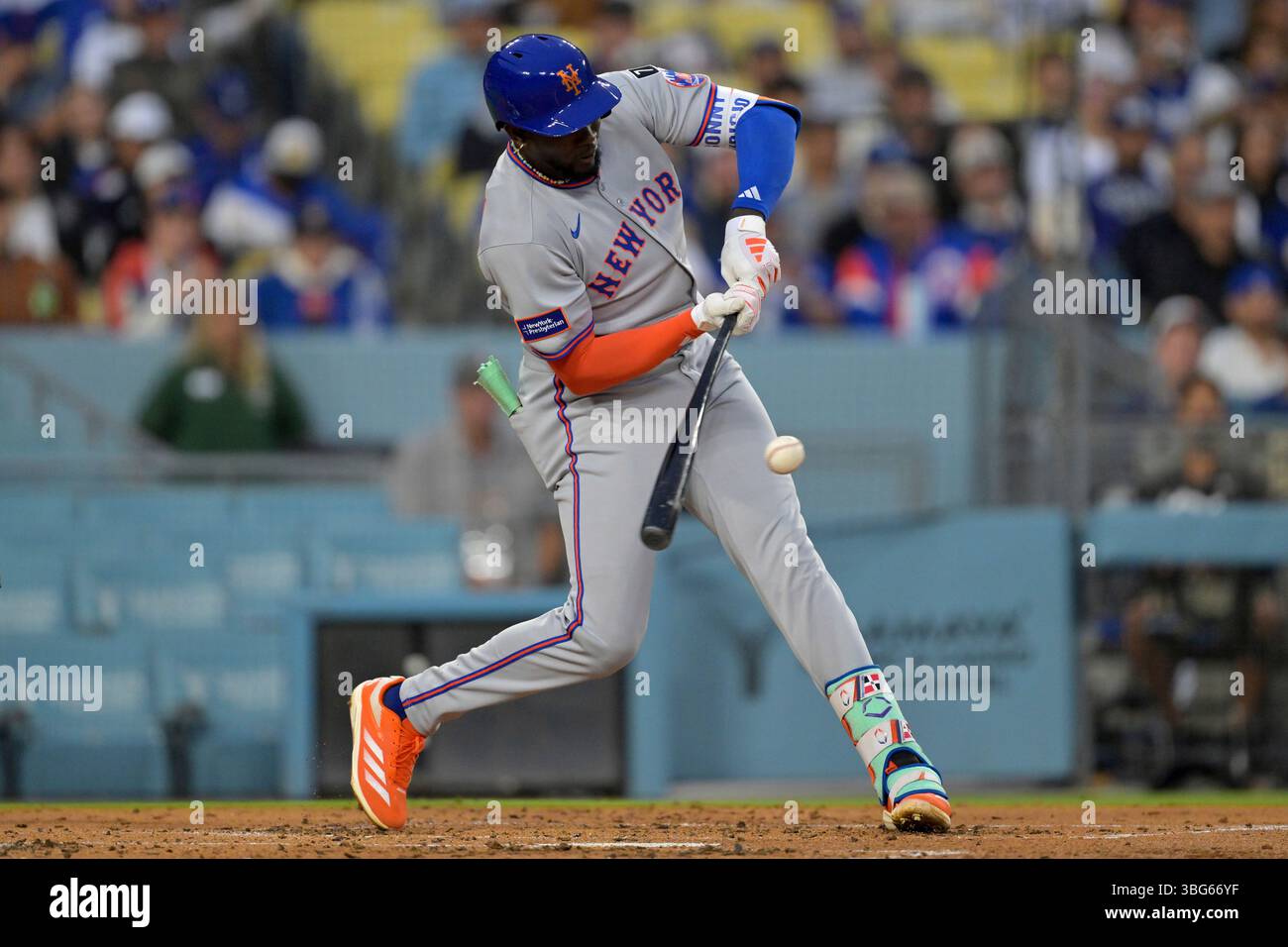 New York Mets' Ronny Mauricio grounds into a double play during the ...