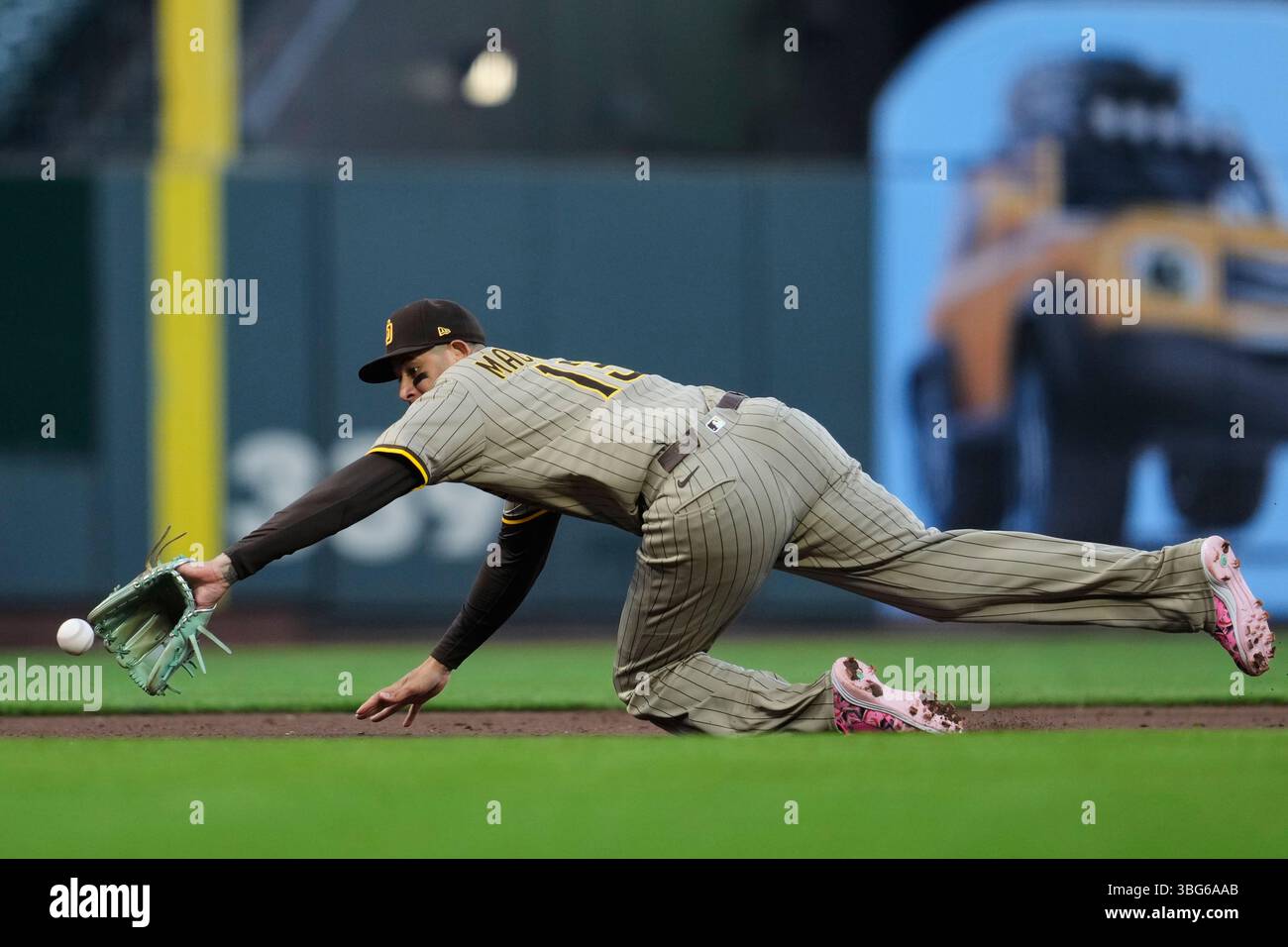 San Diego Padres third baseman Manny Machado fields a grounder hit for ...