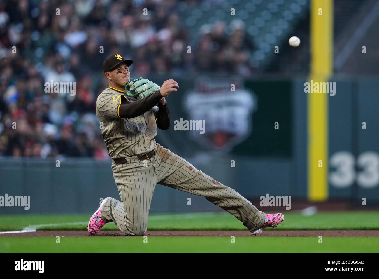 San Diego Padres third baseman Manny Machado throws to first on a ...