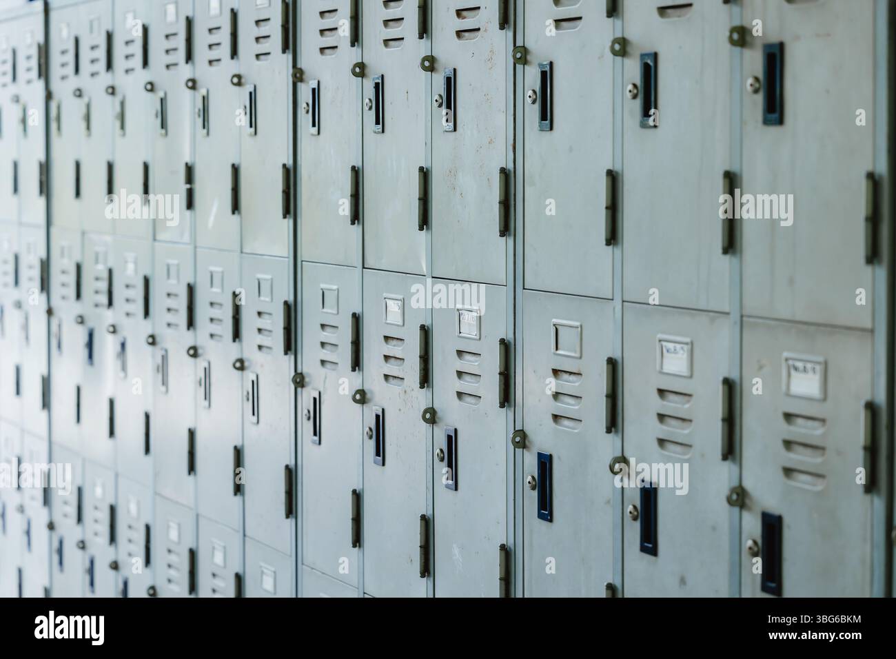 High school student working at her locker hi-res stock photography and ...