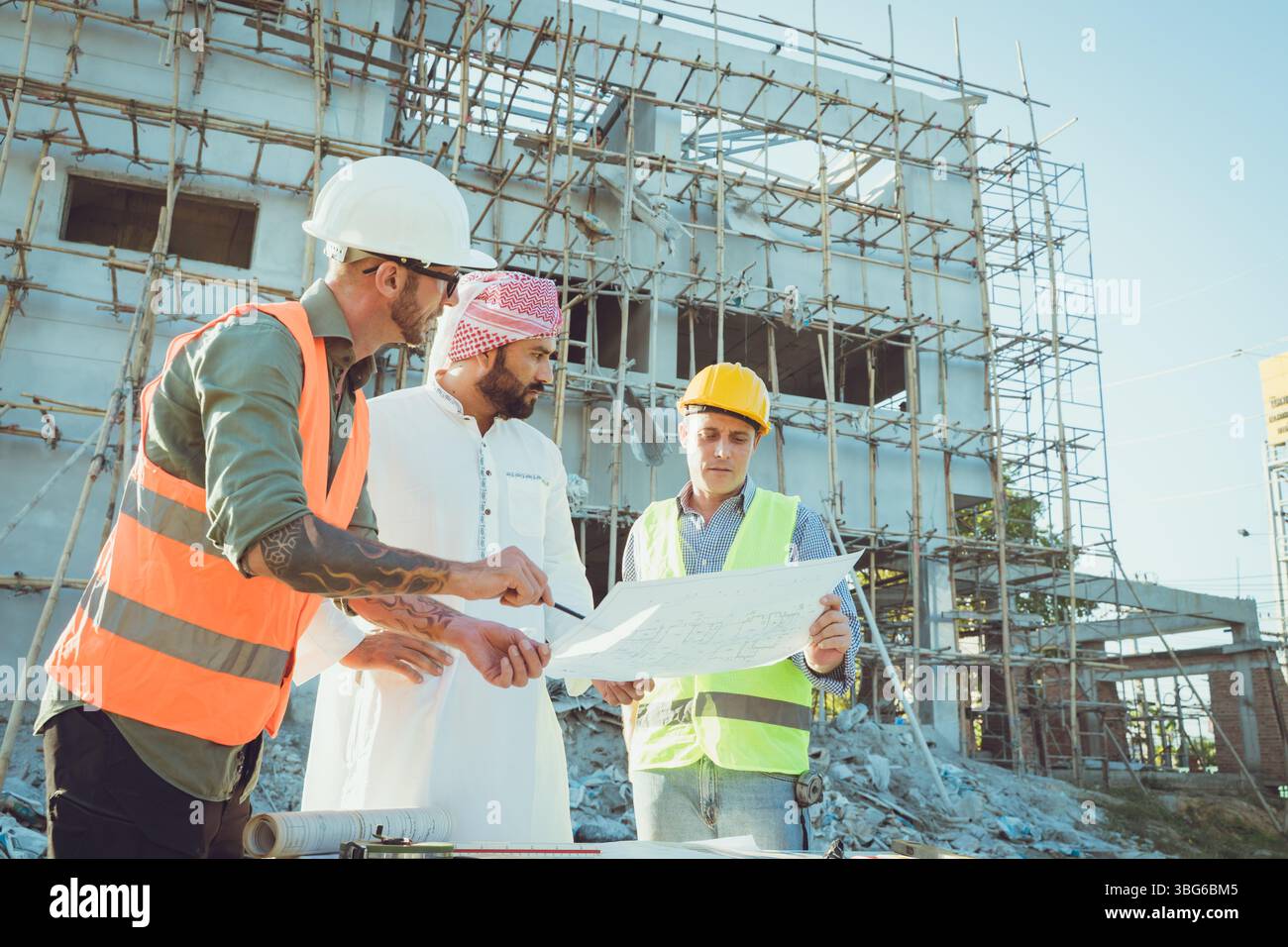 Arab construction engineer architect, Muslim builder working outdoor at ...