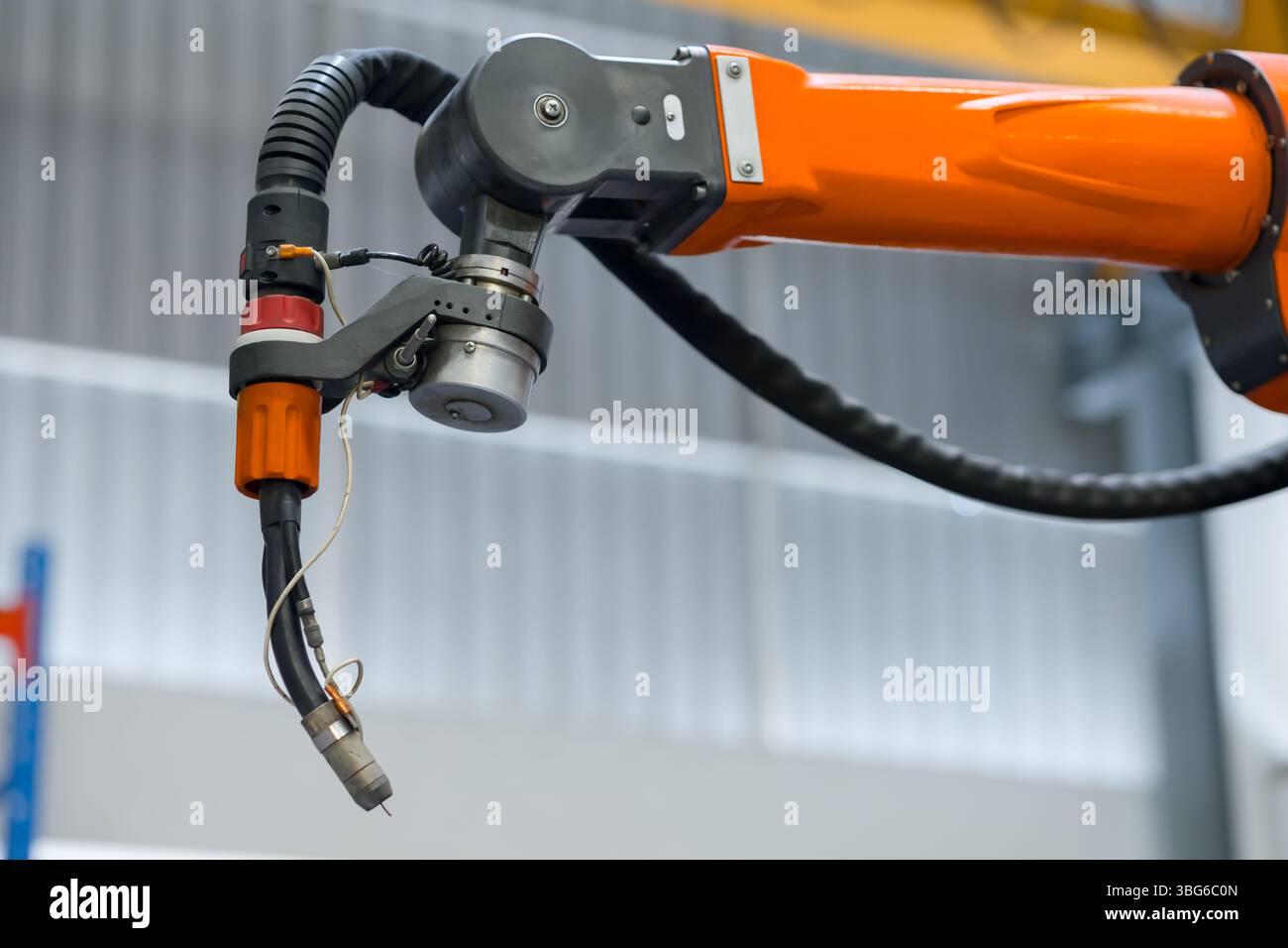 closeup welder head Robotic Smart Welding Machine. Welder arm machine ...