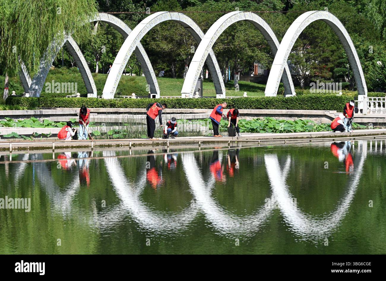 HANDAN, CHINA - JUNE 4, 2025 - Volunteers are cleaning up garbage and ...