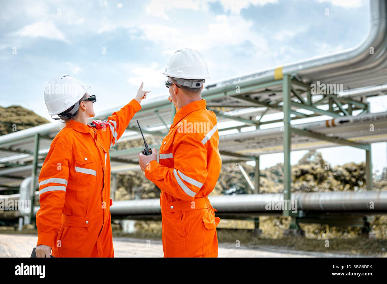 Petroleum refinery service worker, Oil and Gas outdoor transport pipes ...