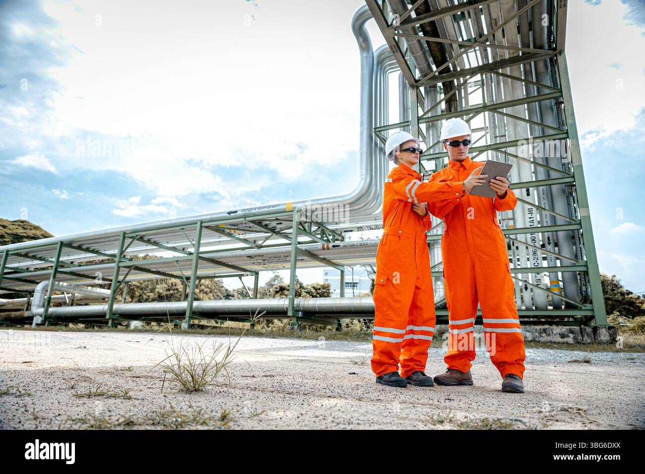 Petroleum refinery service worker, Oil and Gas outdoor transport pipes ...