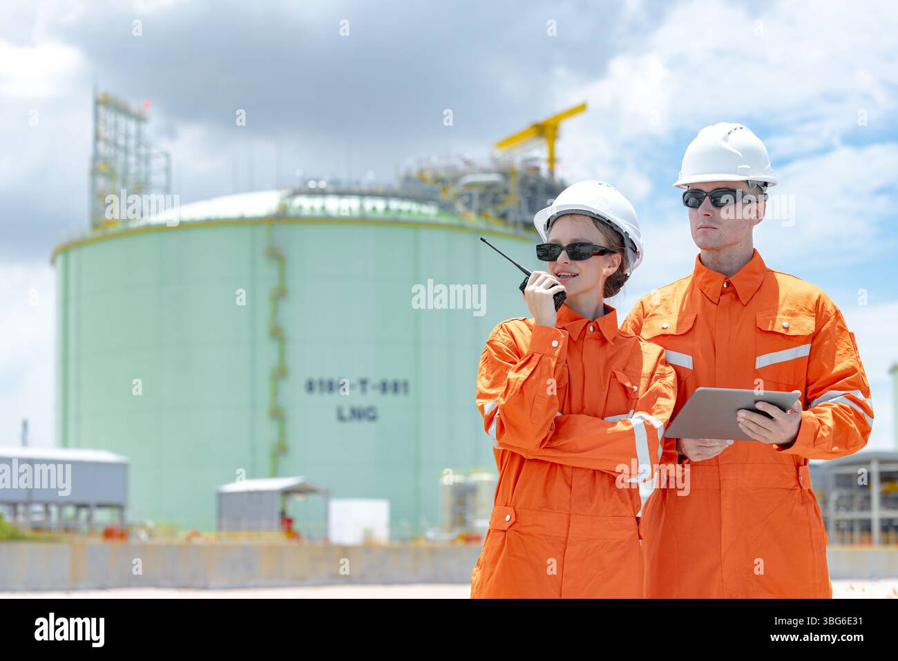 Professional Petroleum male workers, Containment LNG tank service inspection, Onshore Gas Site ...