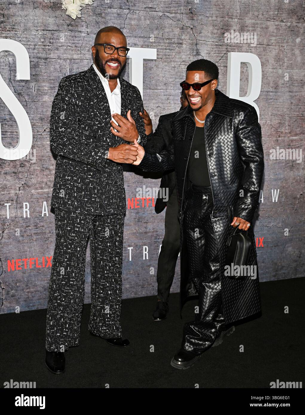 Tyler Perry, left, and Mike Merrill attend the Netflix special ...