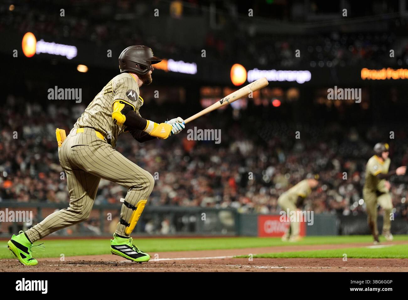 San Diego Padres' Jake Cronenworth runs after hitting an RBI single ...