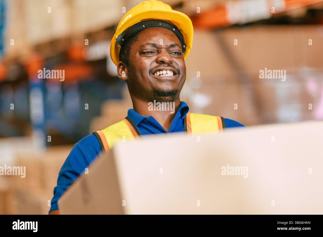 warehouse worker carrying lifting very heavy weight box moving storage ...