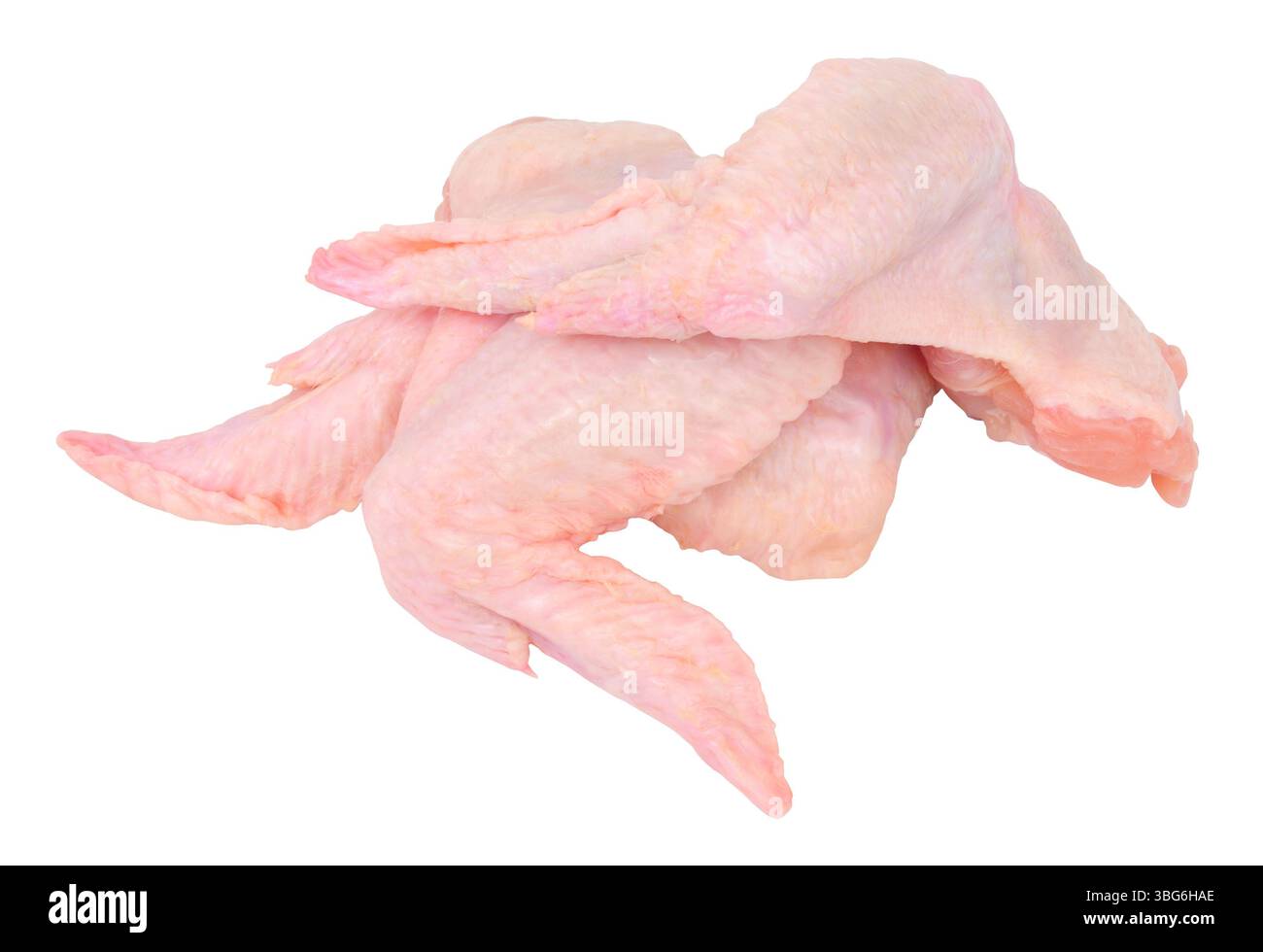 Group of fresh raw prepared skin on chicken wings isolated on a white ...