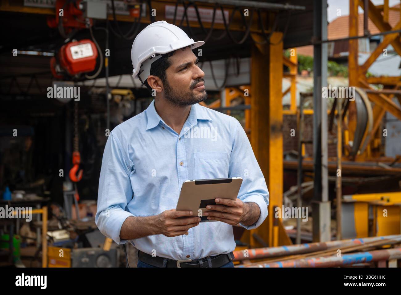 Portrait Hispanic Indian construction engineer male worker at ...