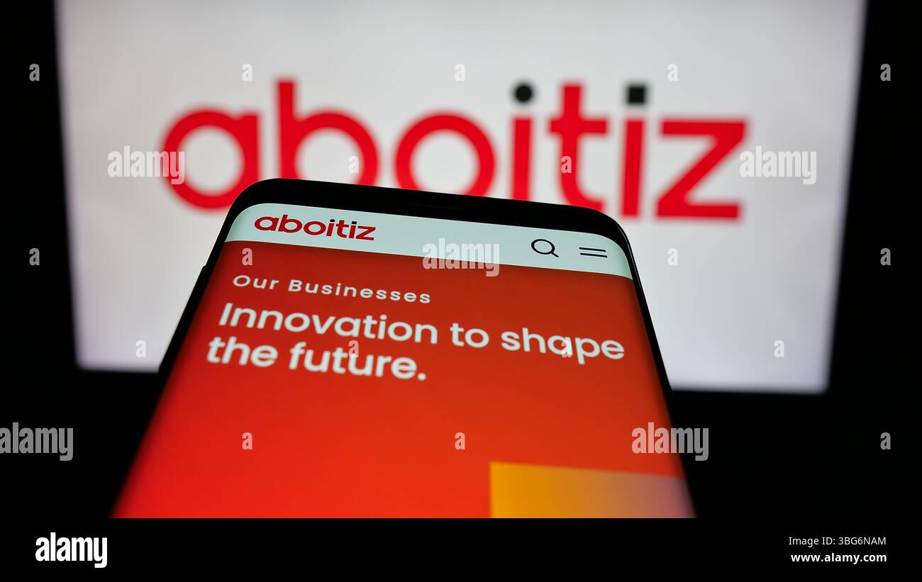 In this photo illustration, a mobile phone with the website of Aboitiz ...