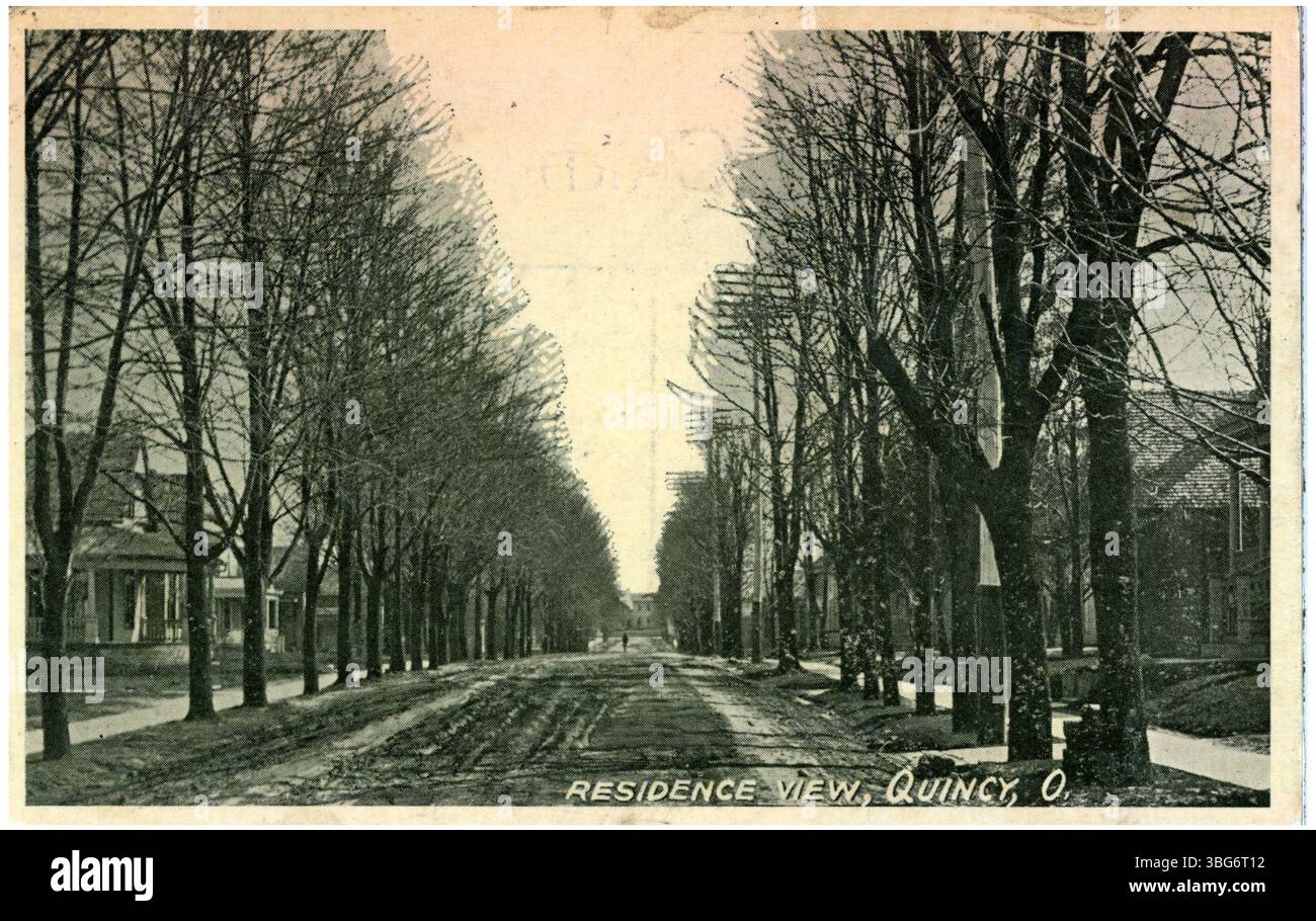 This 1912 photograph shows a residential view in Quincy, Ohio ...