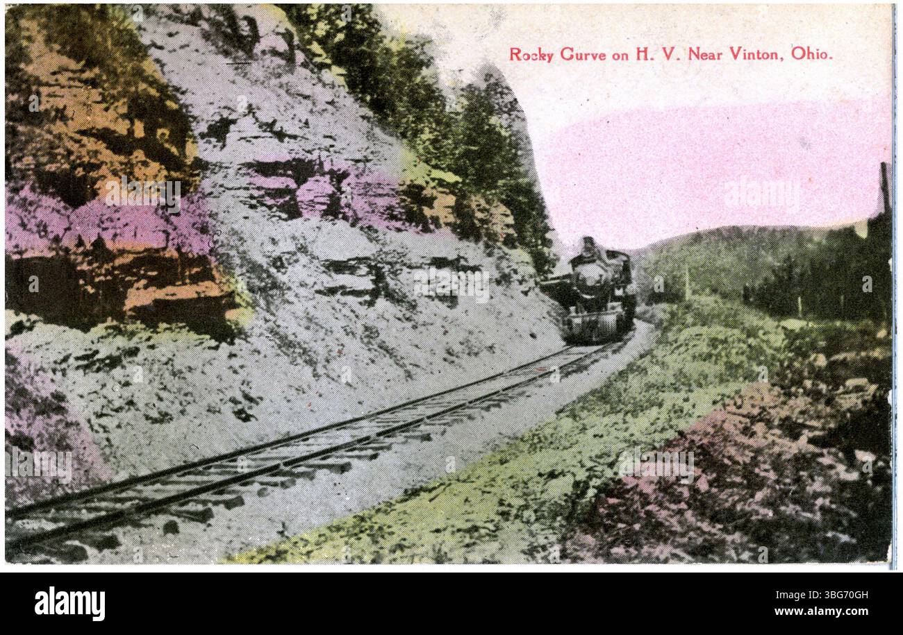 This 1911 photograph shows a steam locomotive rounding the bend at ...