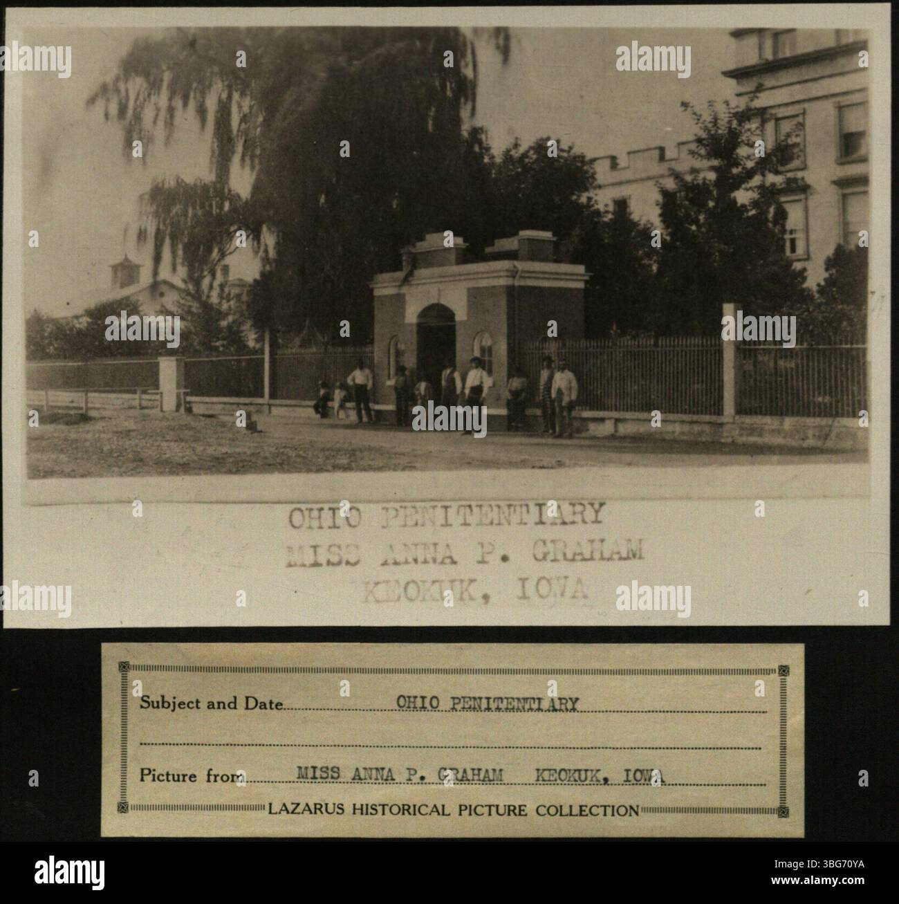 This image shows prisoners and a guard at the entrance gate of the Ohio ...