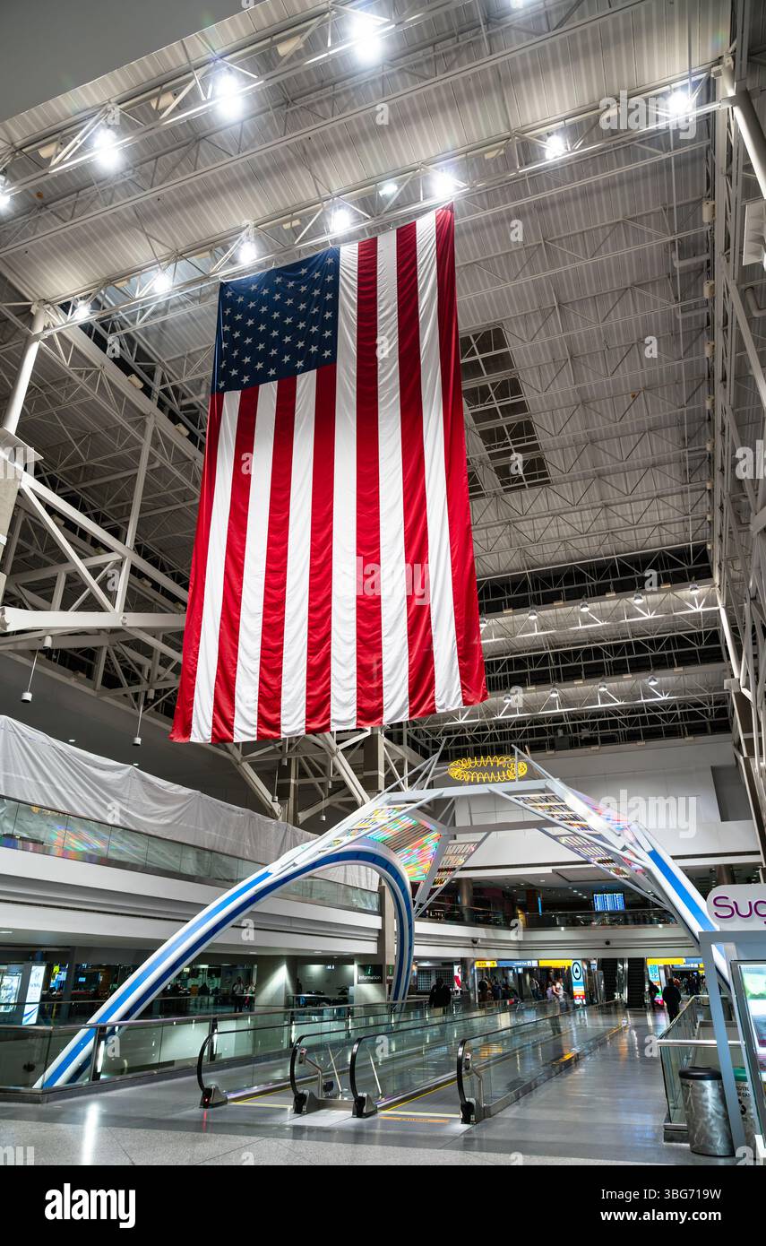 Denver, Colorado - May 23, 2025: Huge American flag hangs above a ...