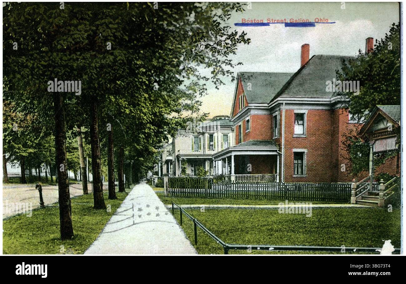 This photograph depicts houses along a tree-lined Boston Street in ...