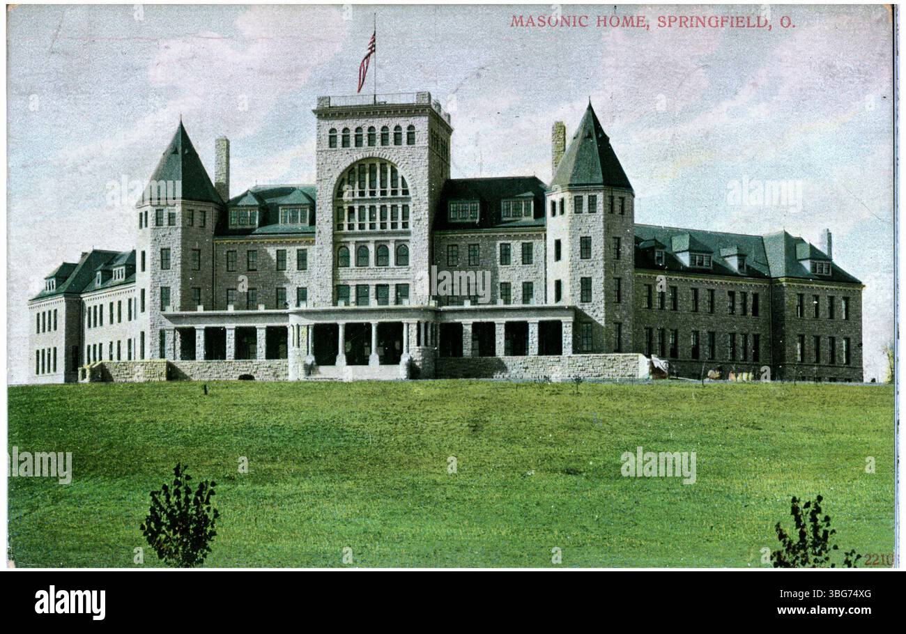A colored print from 1909 showing a large stone building with turrets ...