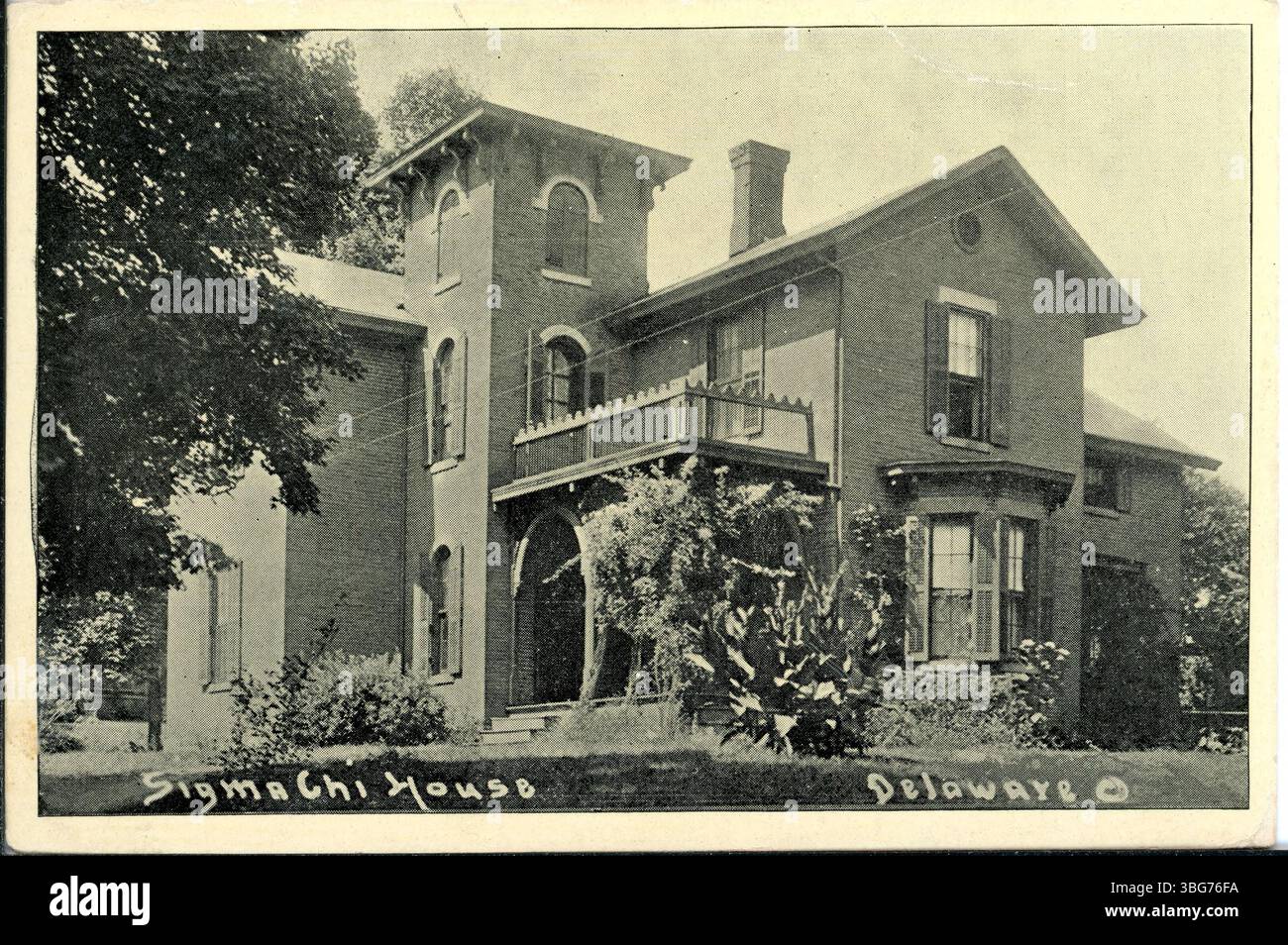 Black and white postcard of the Sigma Chi House at Ohio Wesleyan ...