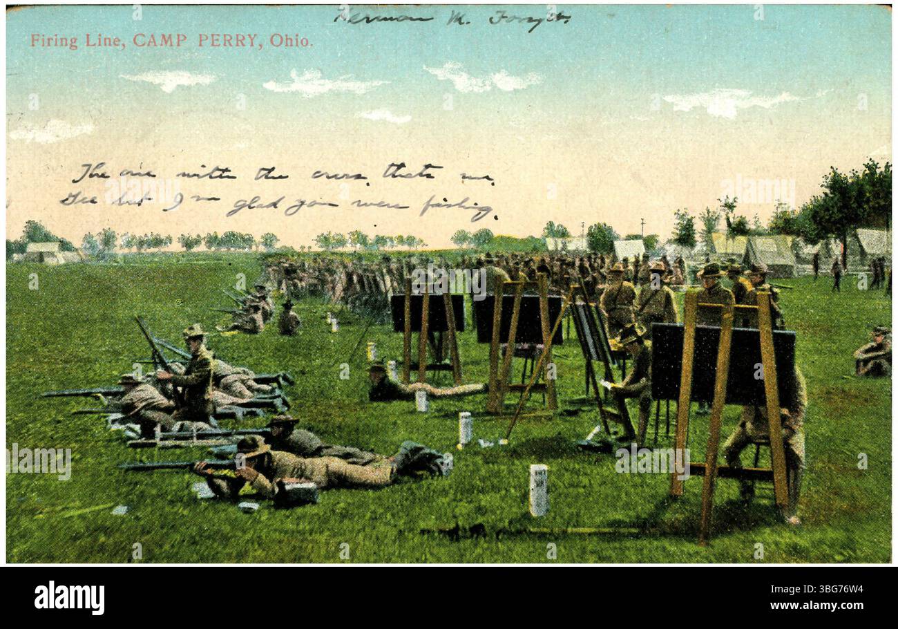 A photograph showing a firing line at Camp Perry, Ohio, during World War One. The image captures ...