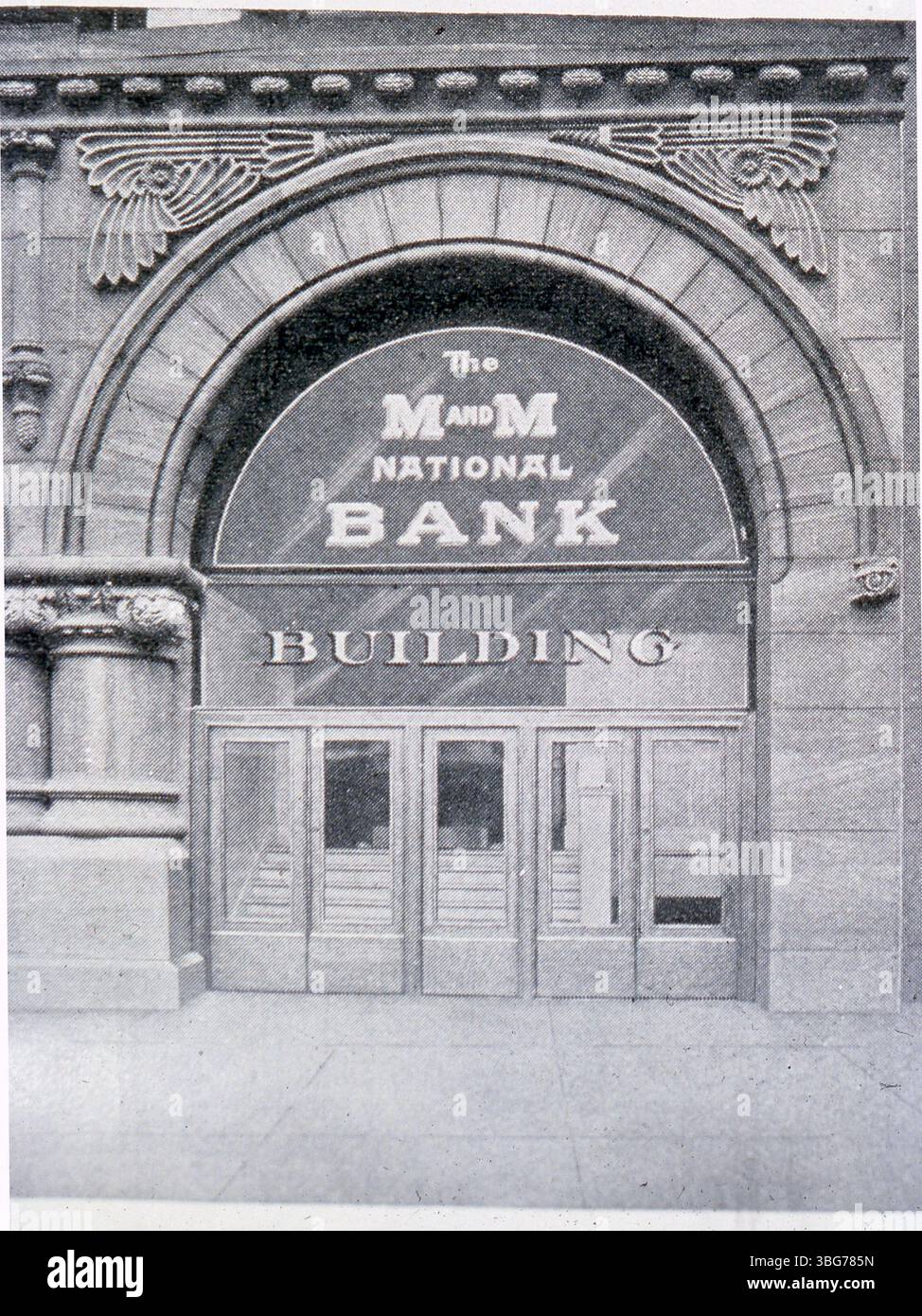 A 1903 photograph showing the main entrance of the Merchants and ...