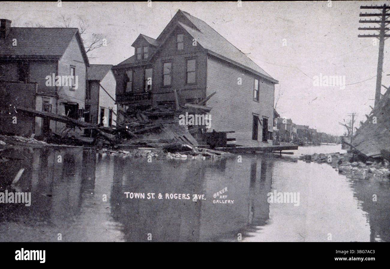 The 1913 photograph shows flooding at West Town Street and Rogers ...