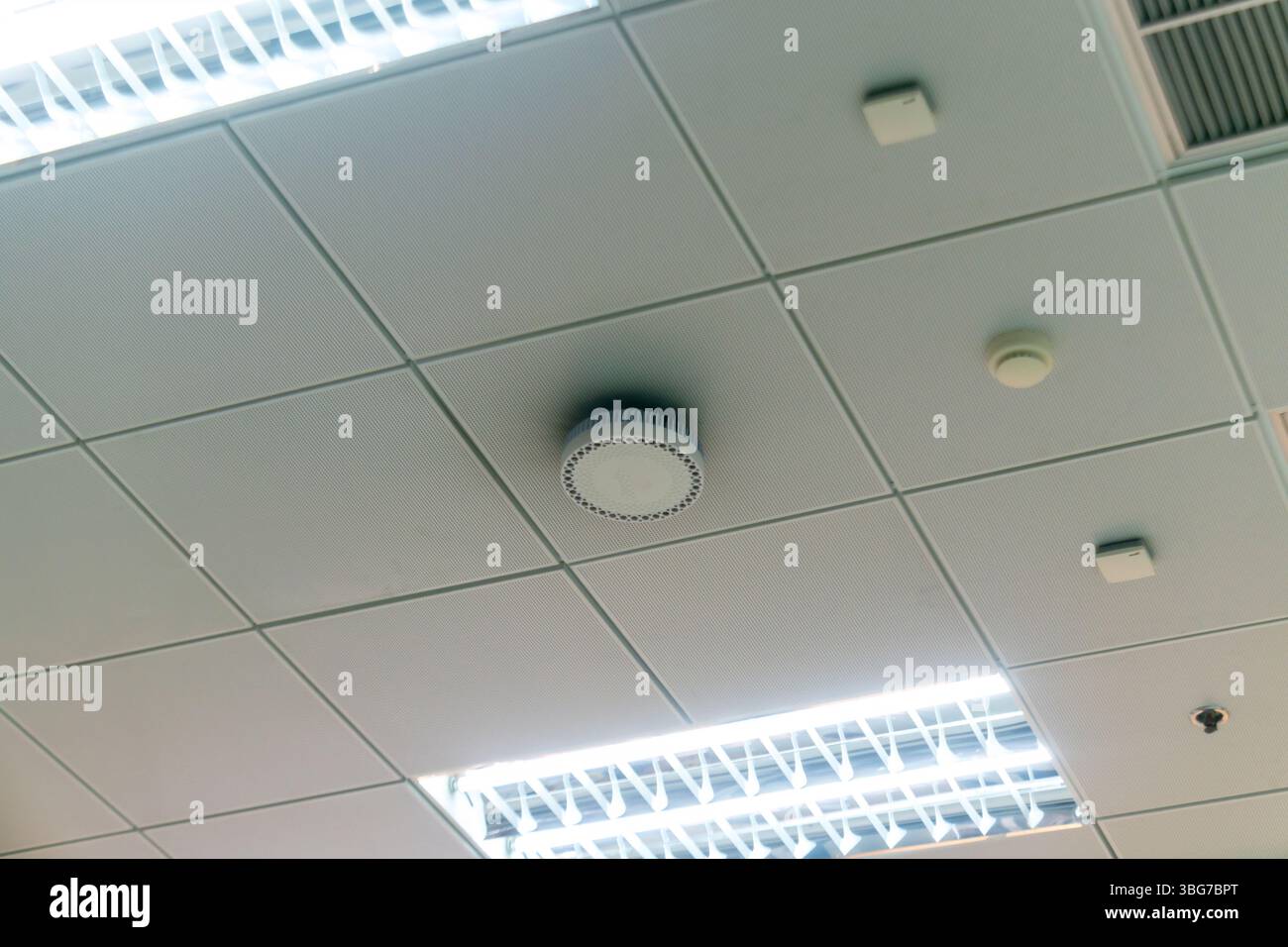This image showcases a modern ceiling design featuring fluorescent ...