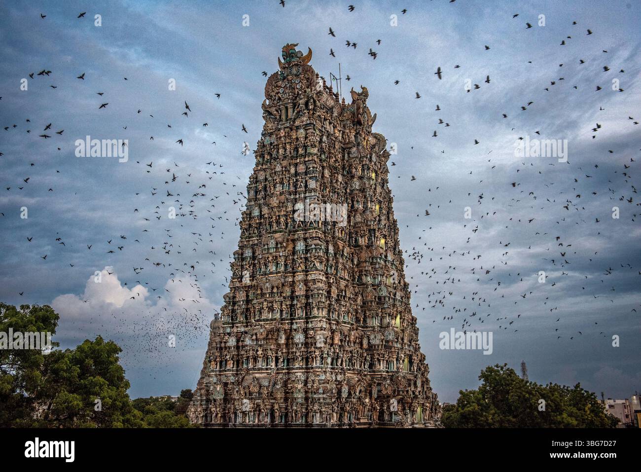 One of the towers of the Meenakshi Amman Temple in Madurai Stock Photo ...