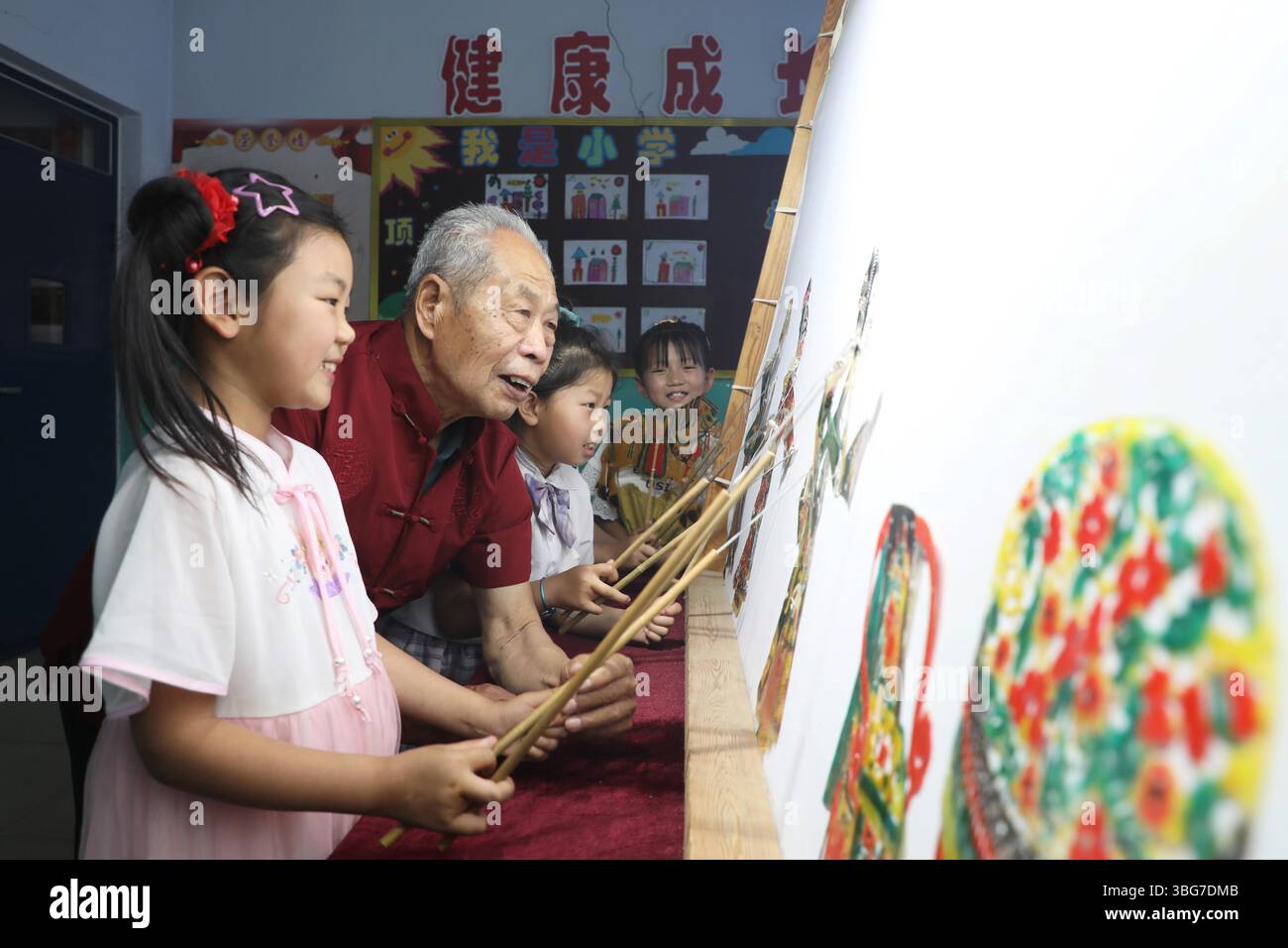 Pupils experience the shadow puppet play to welcome Children's Day in ...