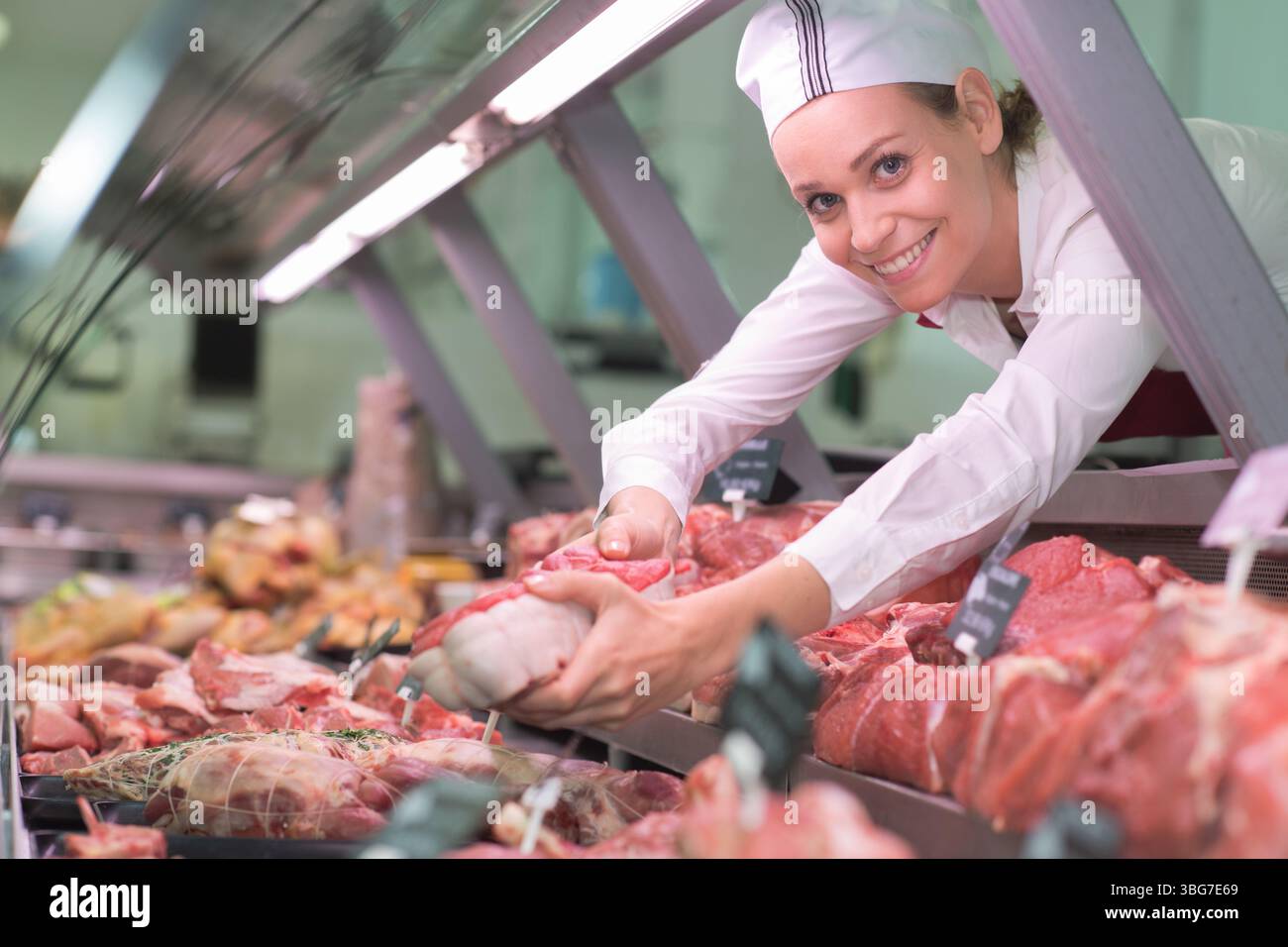 happy female butcher Stock Photo - Alamy