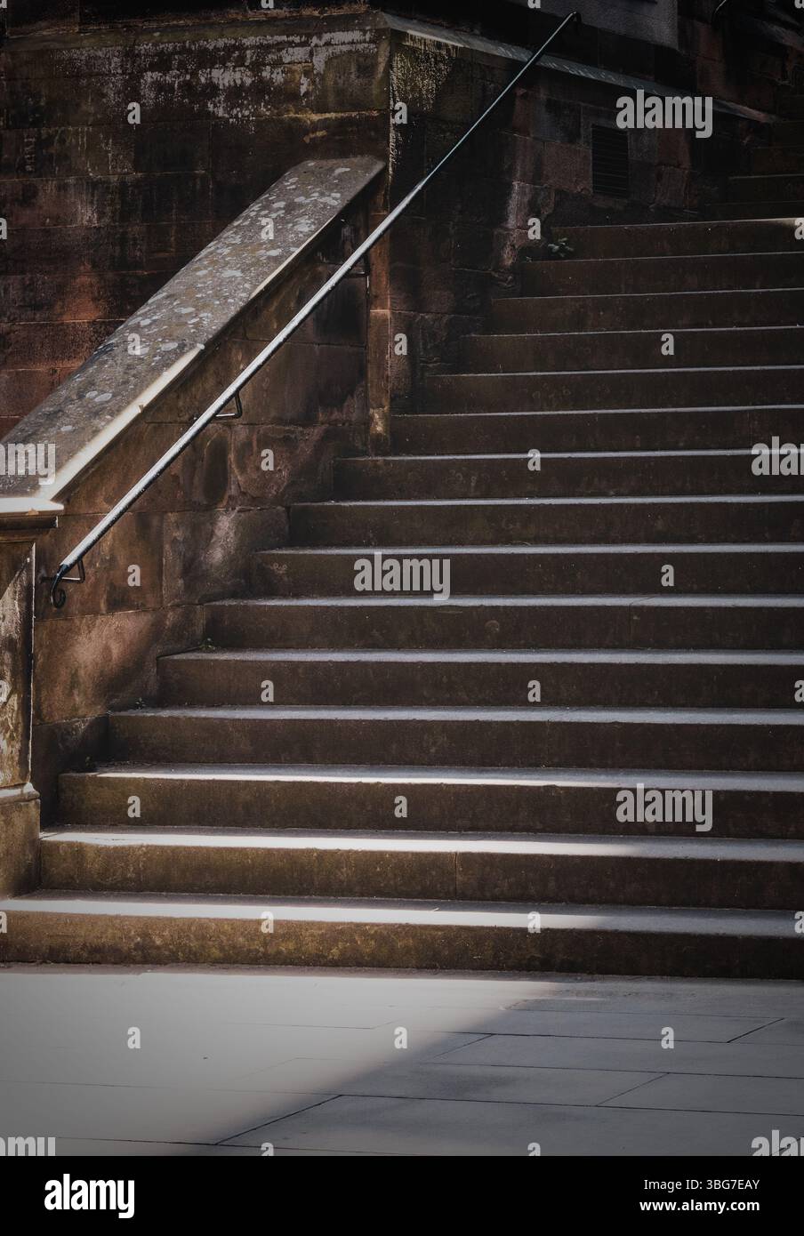 Steps in shadow in the quad at New College University, Edinburgh ...