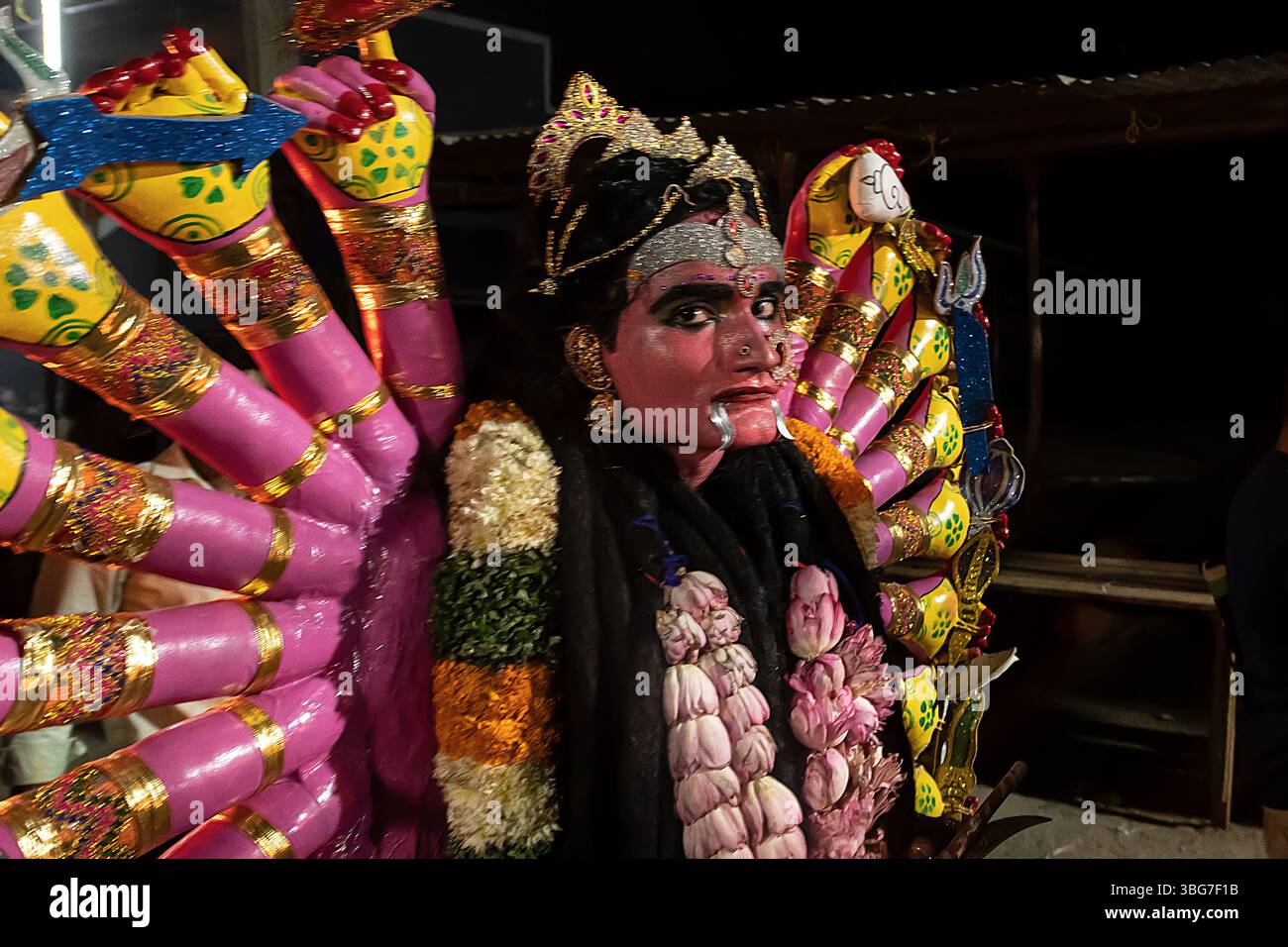 The parade ends in the beach of Kulasai village. The devotees are ...