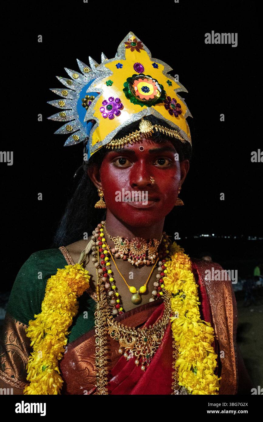 The parade ends in the beach of Kulasai village. The devotees are ...