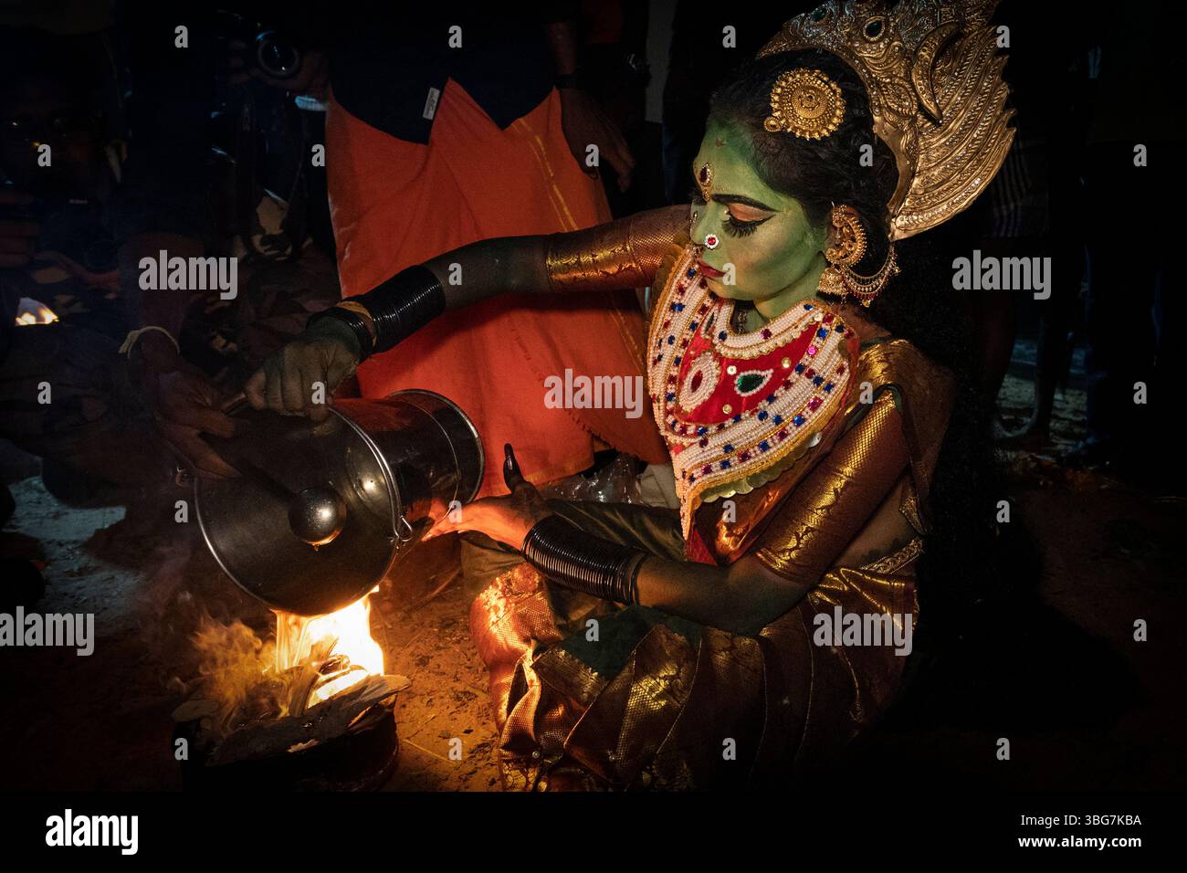The parade ends in the beach of Kulasai village. The devotees are ...