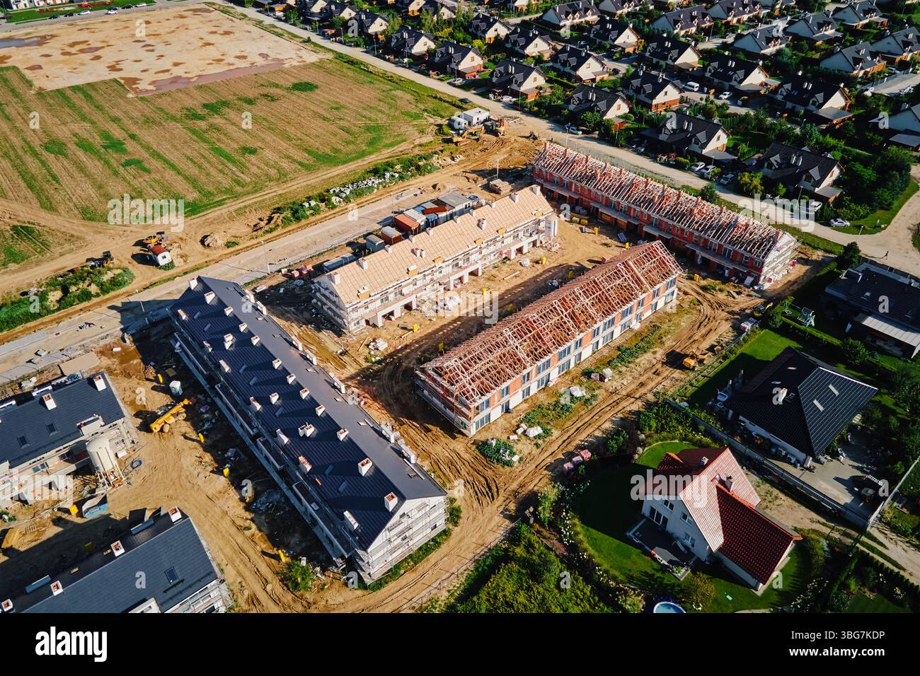 Aerial view of large suburban construction site with residential ...