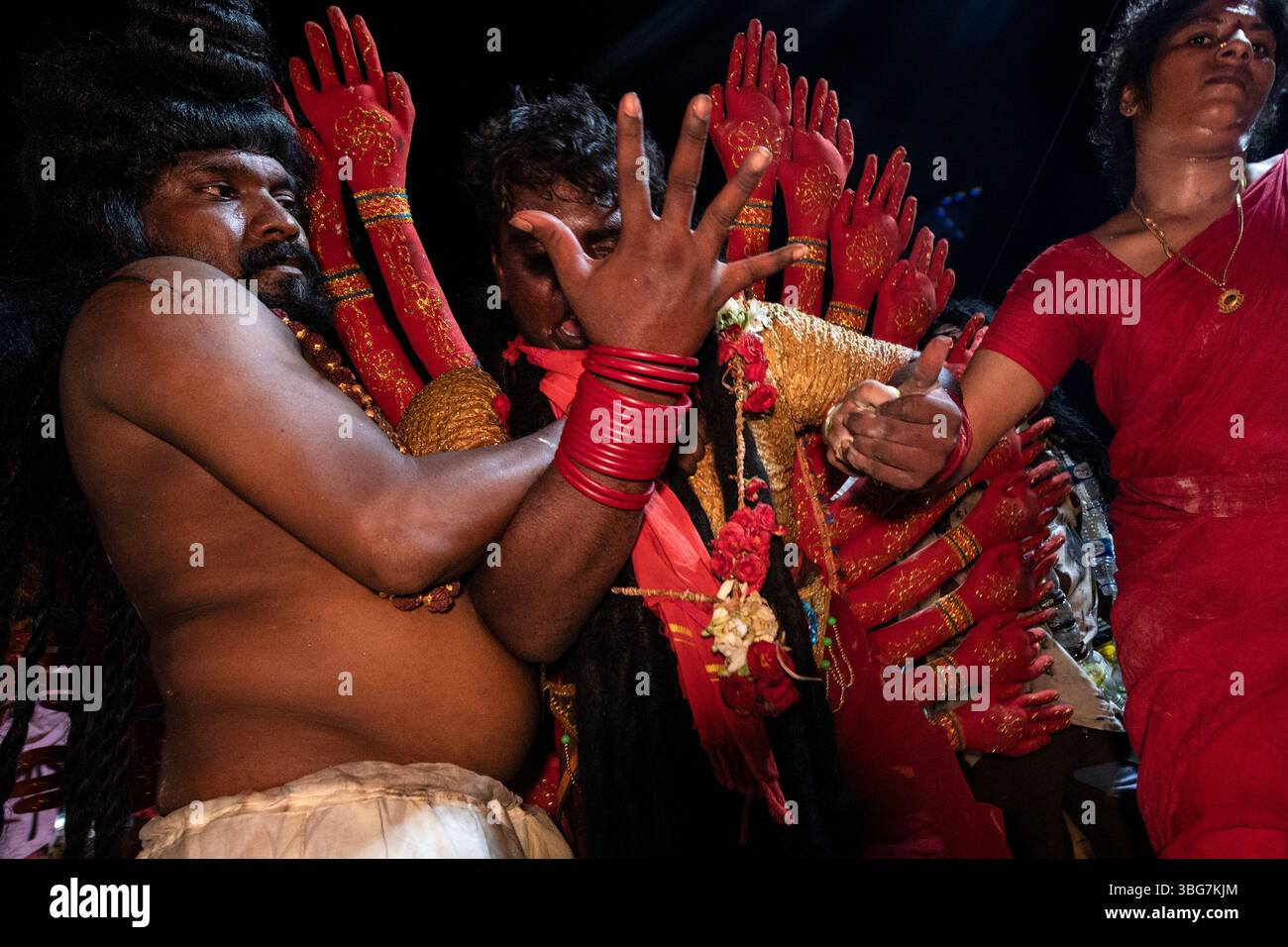 The parade ends in the beach of Kulasai village. The devotees are ...