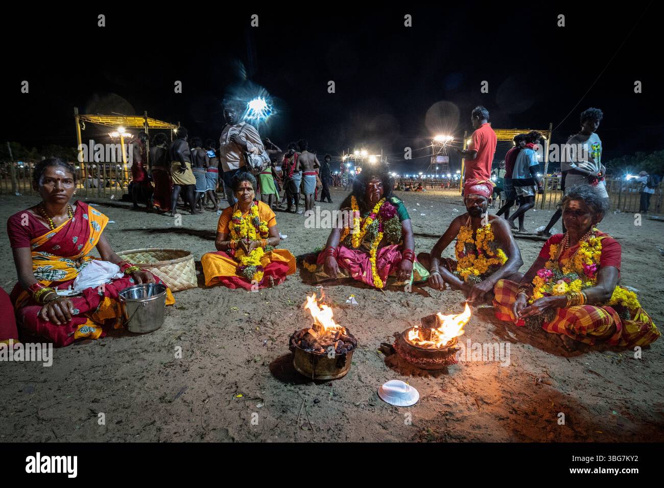 The parade ends in the beach of Kulasai village. The devotees are ...