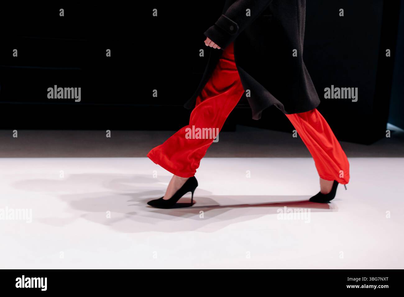 Red pants, black jacket and high heels. Women's fashion and stylish ...