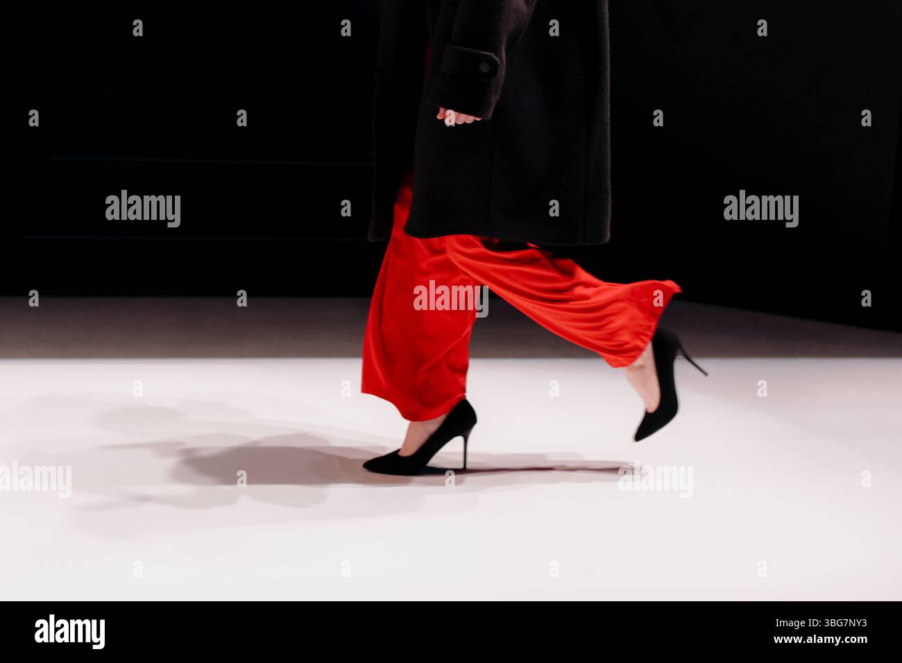 Red pants, black jacket and high heels. Women's fashion and stylish ...